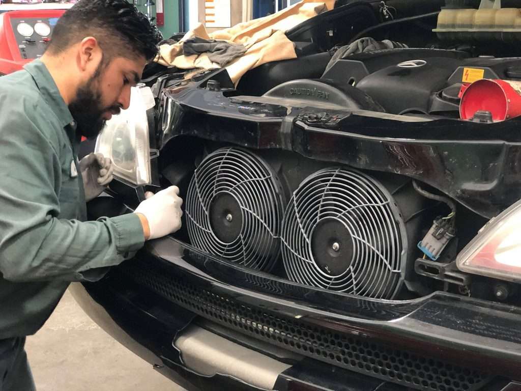 Loud Car Engine Fan? Diagnose the Noise & Fix It Fast!